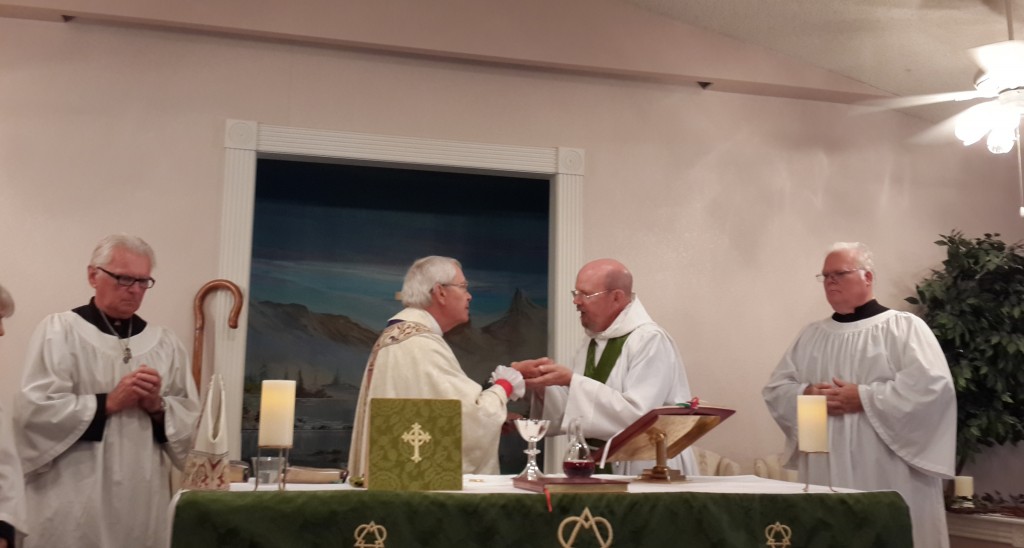 Frank Reeves bp giving him communion - The North Region of the ...